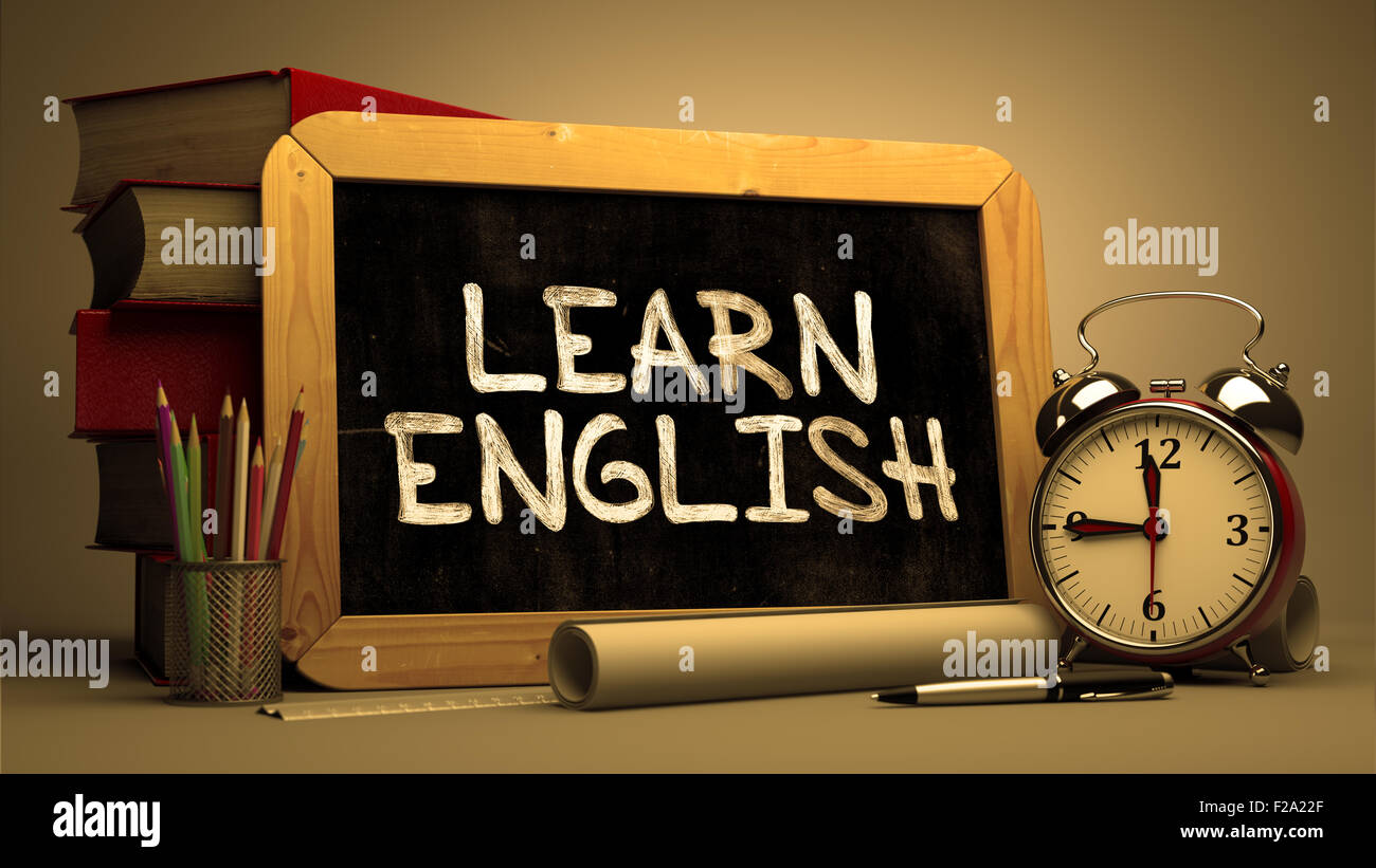 Learn English Concept Hand Drawn on Chalkboard Stock Photo - Alamy