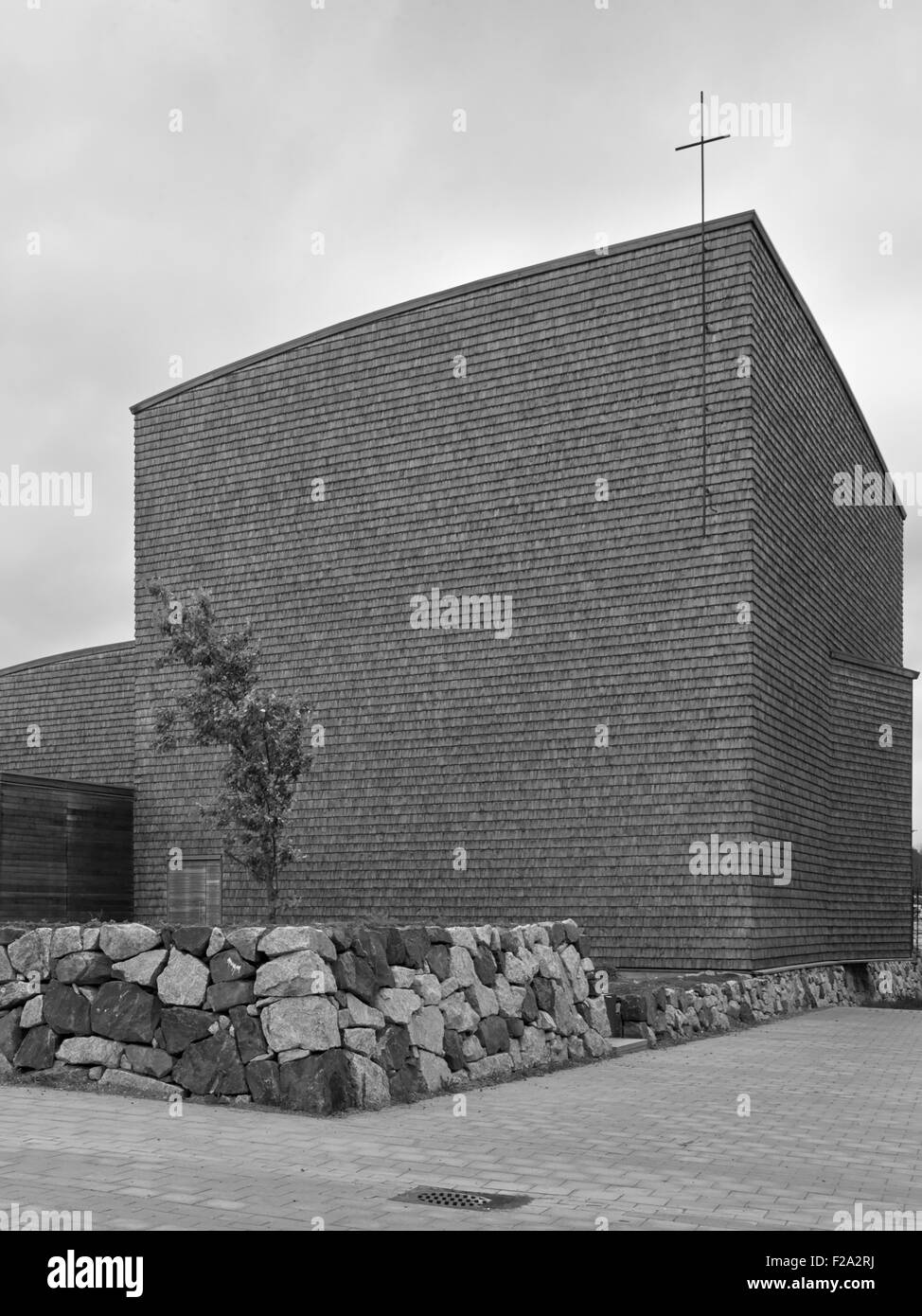 Exterior facade clad with thick aspen shingles, which will turn grey ...