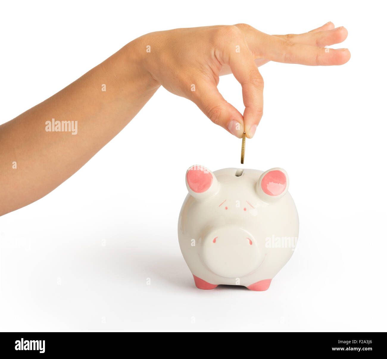 Piggy bank with humans hand Stock Photo - Alamy