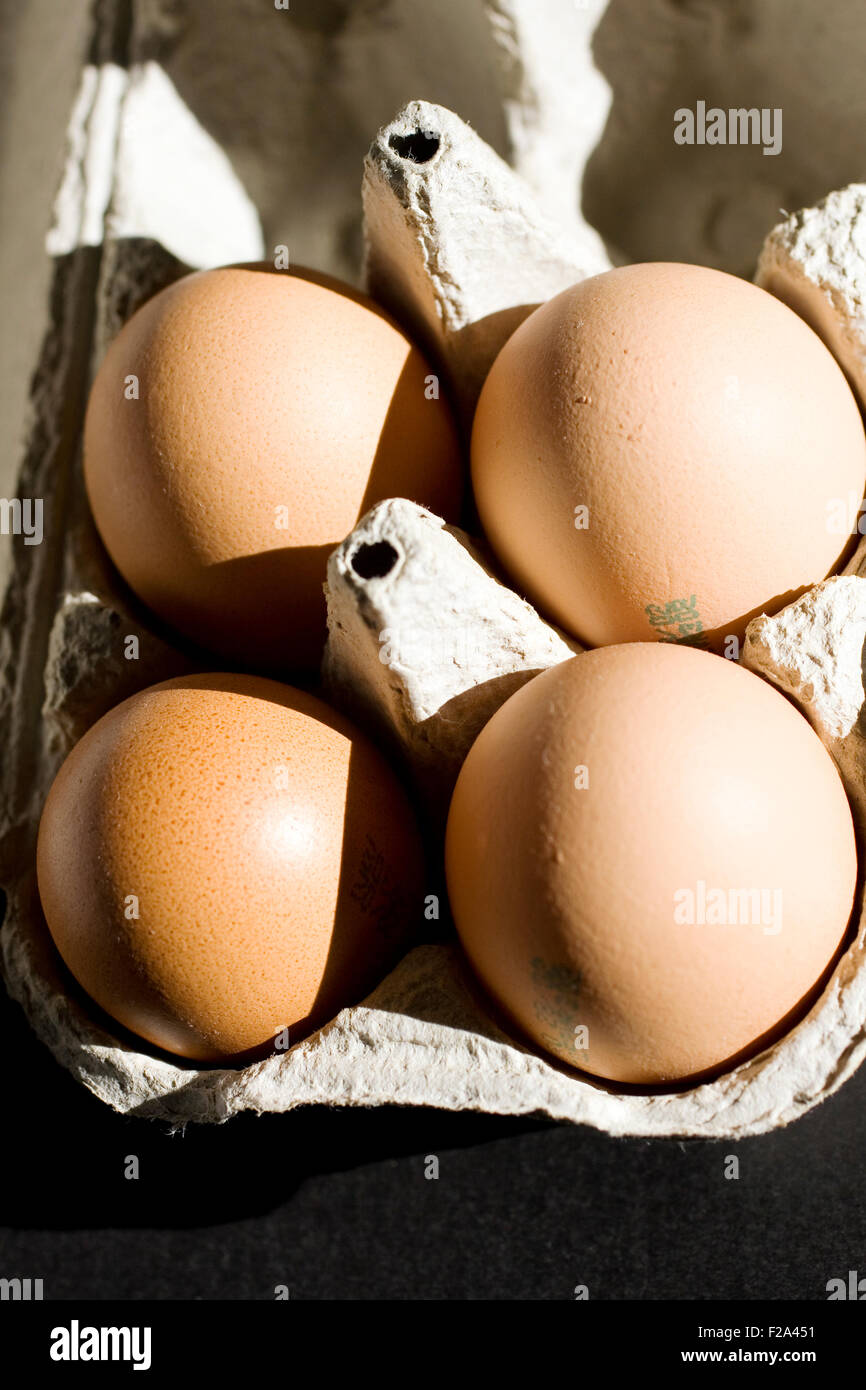 Egs in a gray cardboard box Stock Photo - Alamy