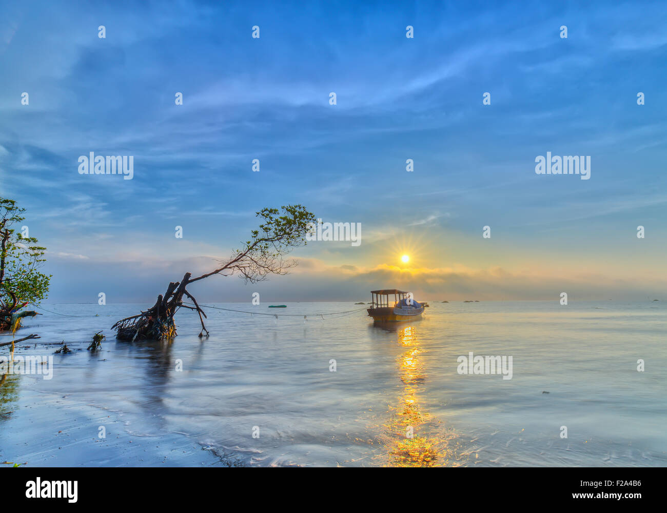 Sunrise over sea Go Cong, Tien Giang, Vietnam Stock Photo - Alamy