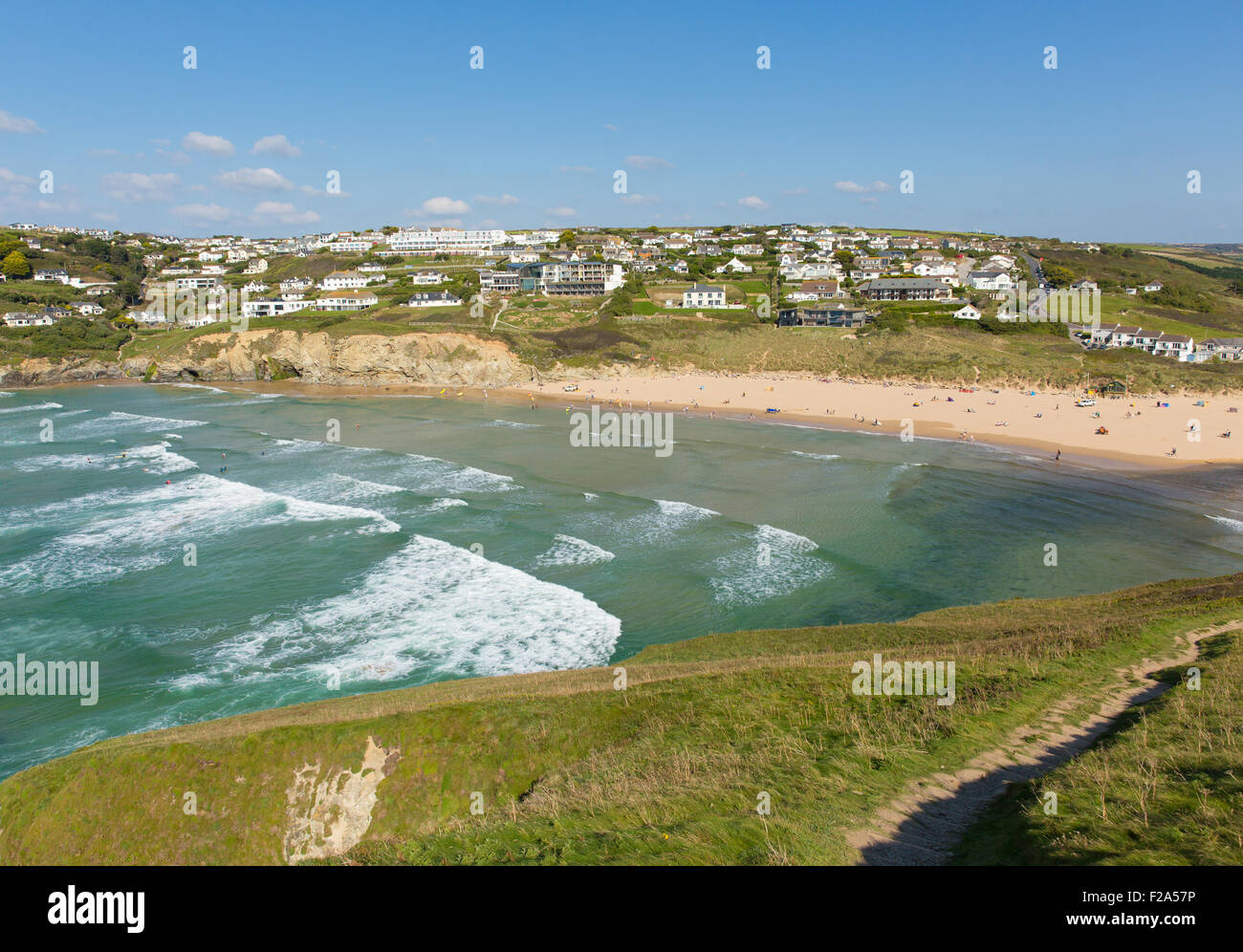 Surfing waves Mawgan Porth beach north Cornwall Atlantic coast England ...