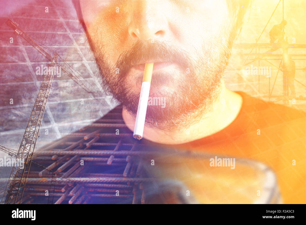Double exposure portrait of male construction worker with cigarette on ...
