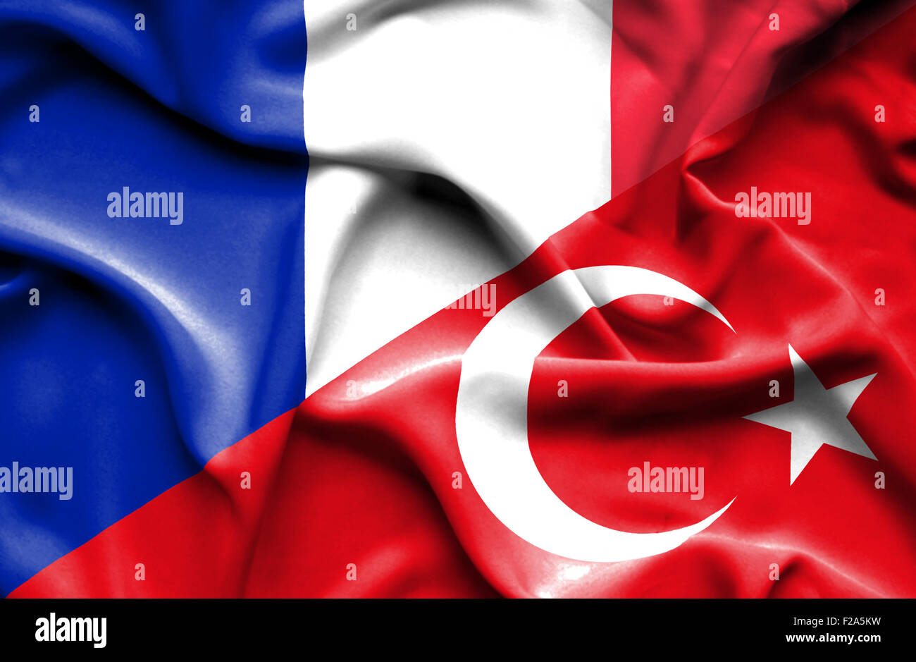 Waving flag of Turkey and France Stock Photo - Alamy