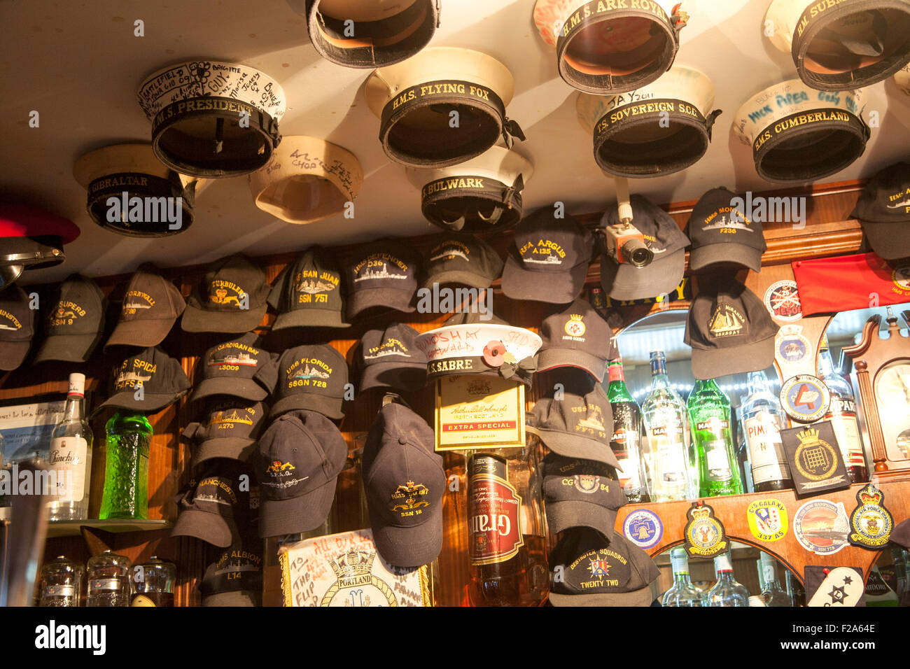 Display of naval caps and hats in pub, Gibraltar, British terroritory ...