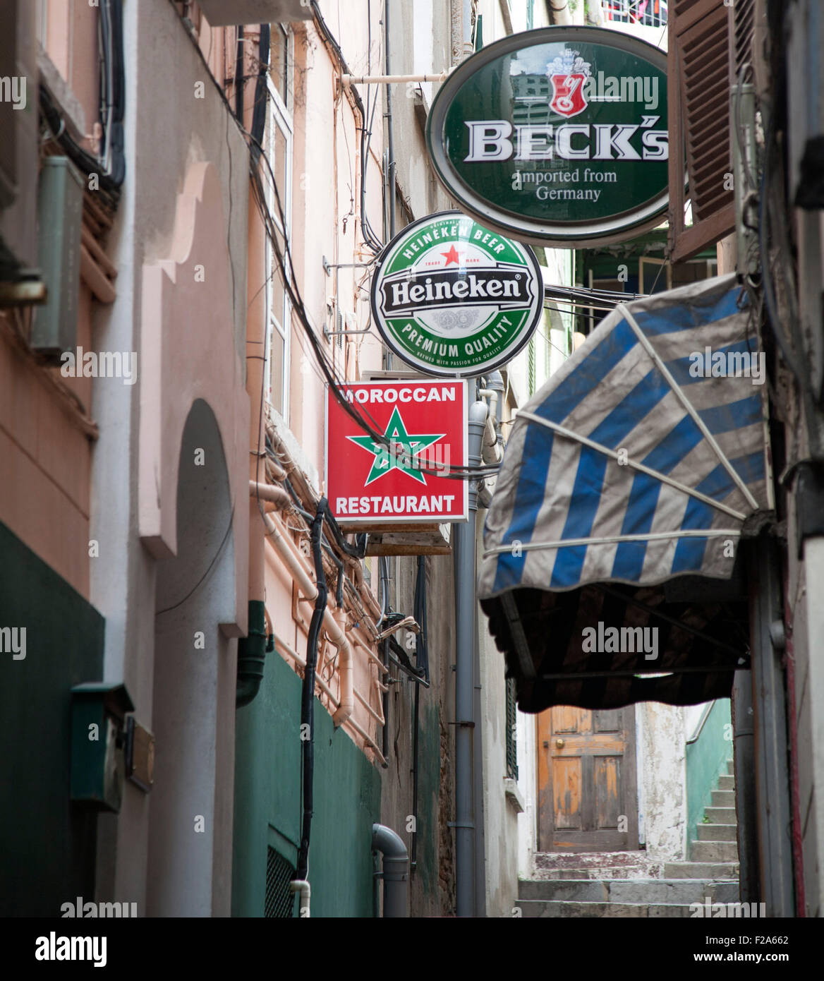 Pub signs in back street alley, Gibraltar, British territory in ...