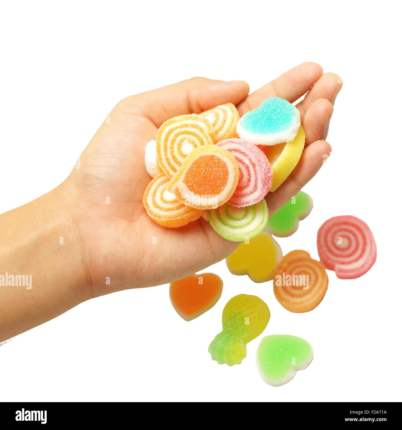 children hand hold jelly sweet candy isolated on white background Stock ...