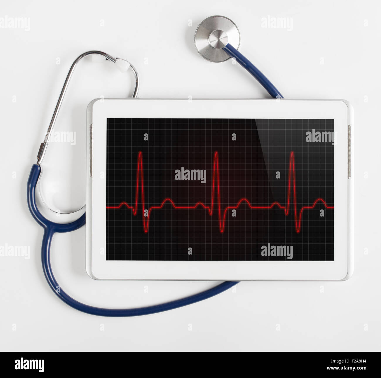 Tablet showing ECG diagram Stock Photo - Alamy