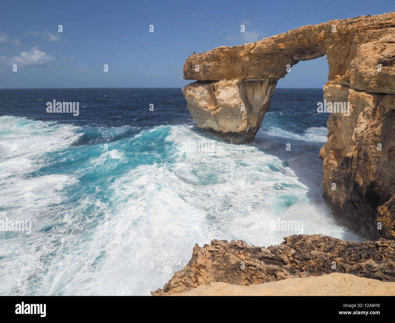 Azure Window, natural stone arch in Dwejra Bay, Gozo, Malta Stock Photo ...
