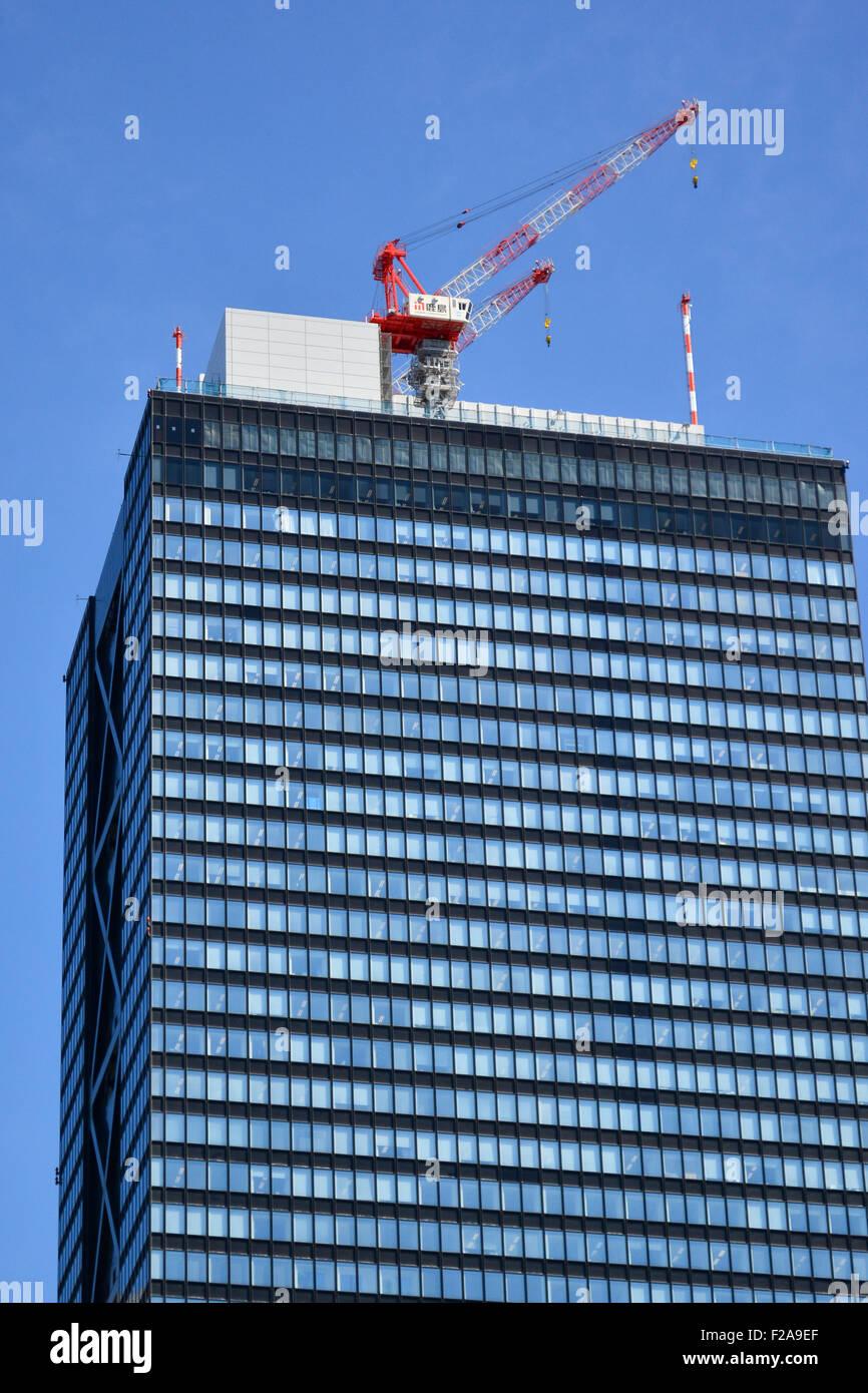 Construction crane on top of skyscraper. Tokyo Stock Photo - Alamy
