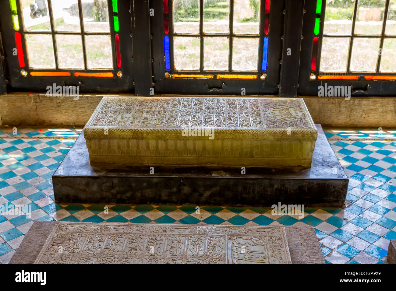 Marble grave by the windows Stock Photo - Alamy