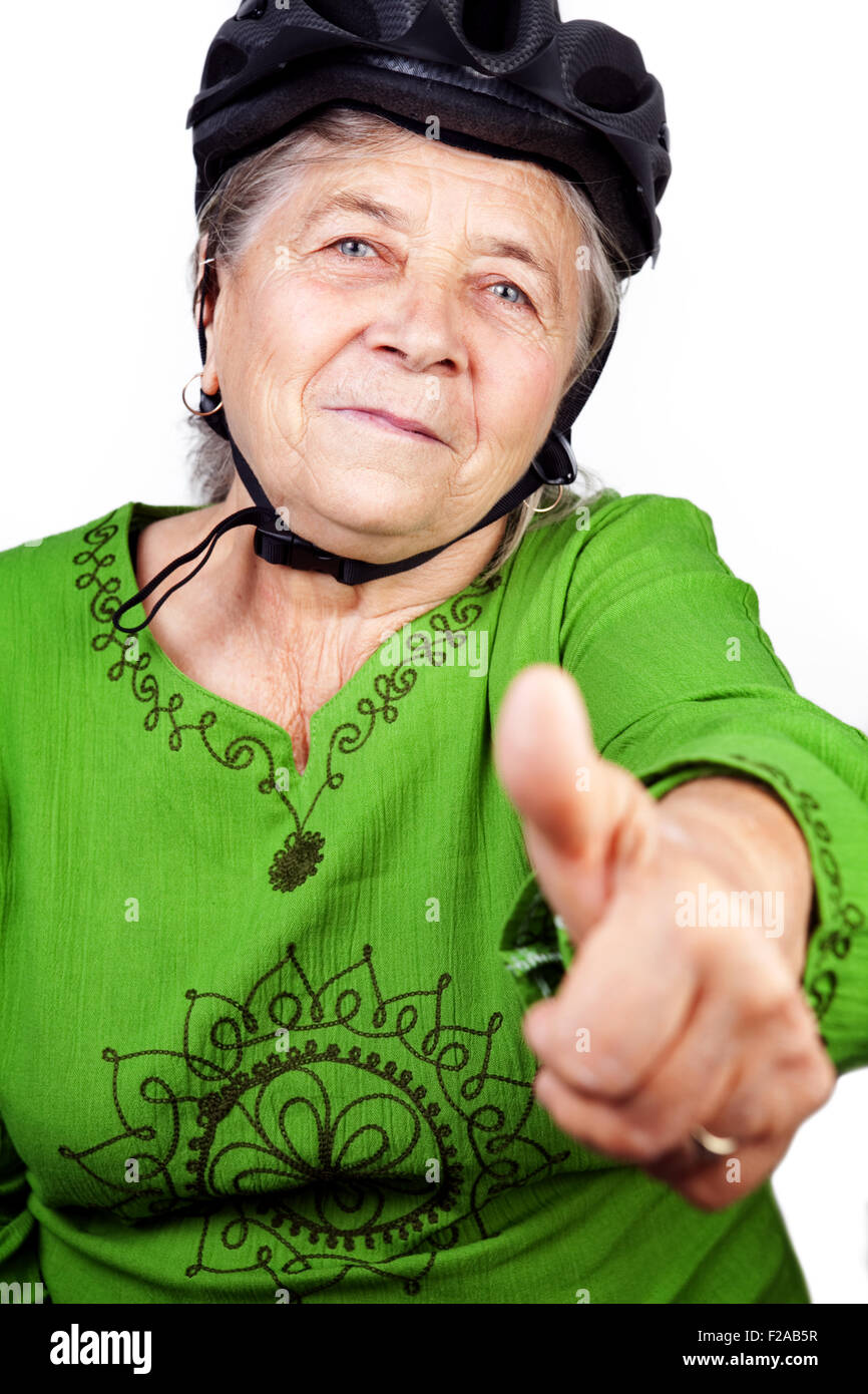 Confident old senior cyclist woman showing ok sign Stock Photo - Alamy