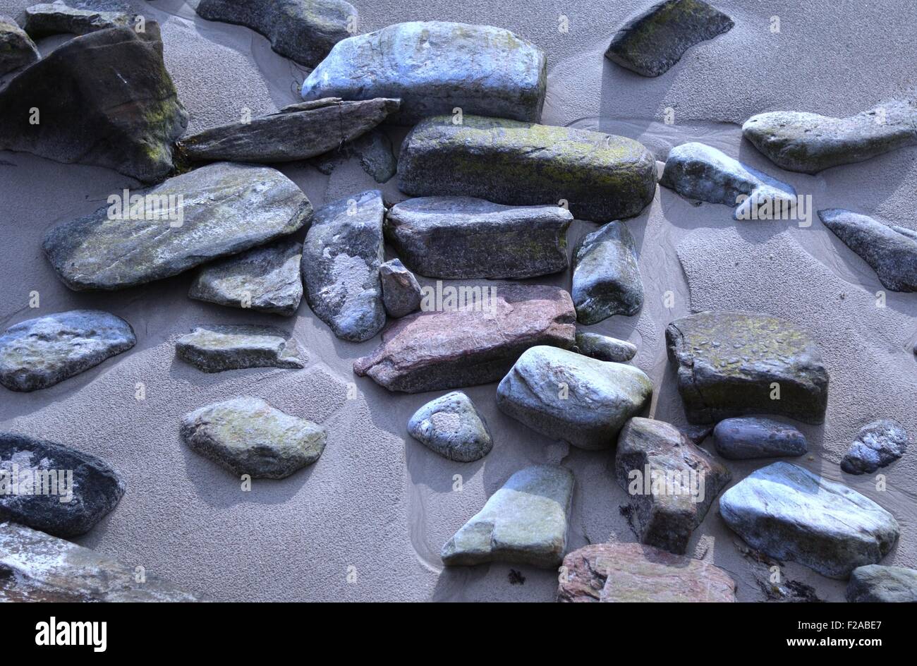 coloured rocks and stones on the beach Stock Photo - Alamy