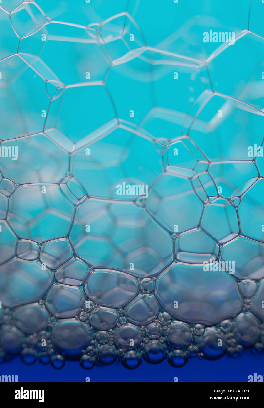 Soap bubbles macro forming hexagonal pattern, vertical image Stock ...