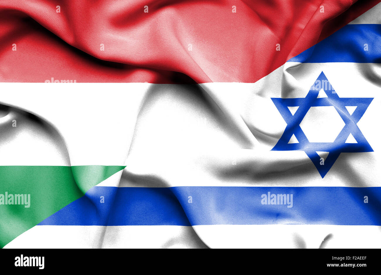 Waving flag of Israel and Hungary Stock Photo - Alamy
