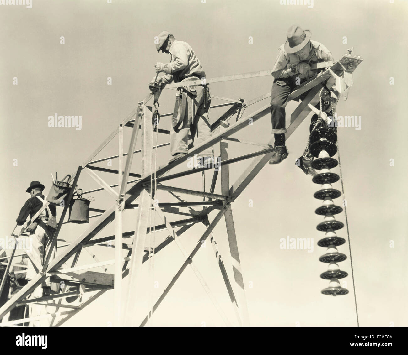 Man working on high voltage power lines hi-res stock photography and ...