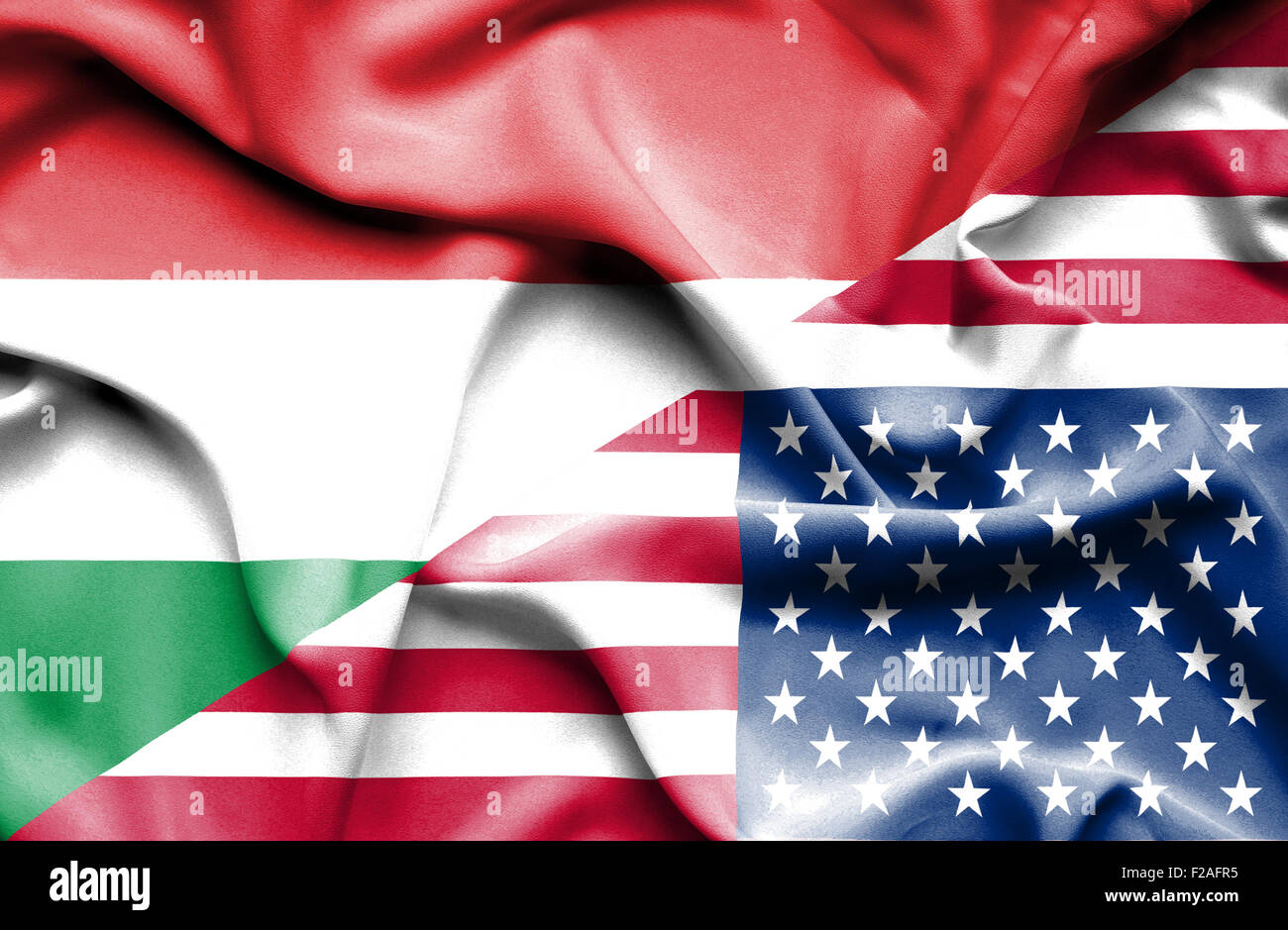 Waving flag of United States of America and Hungary Stock Photo - Alamy