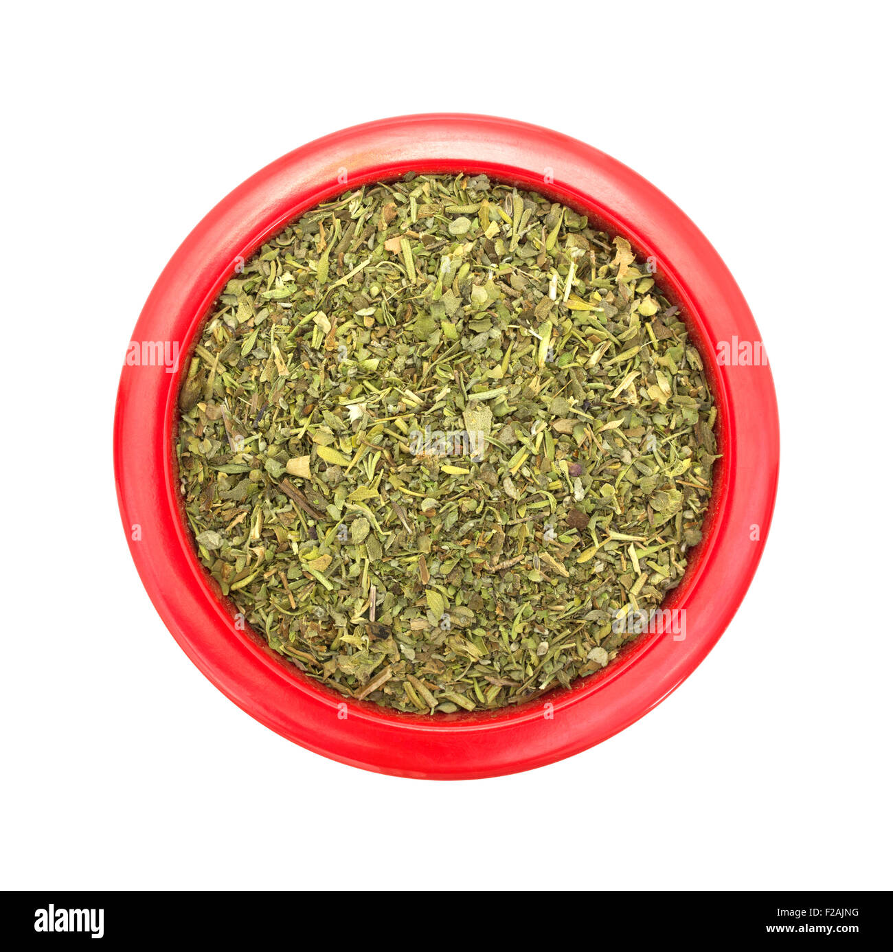Top view of a red dish filled with Italian seasoning isolated on a ...