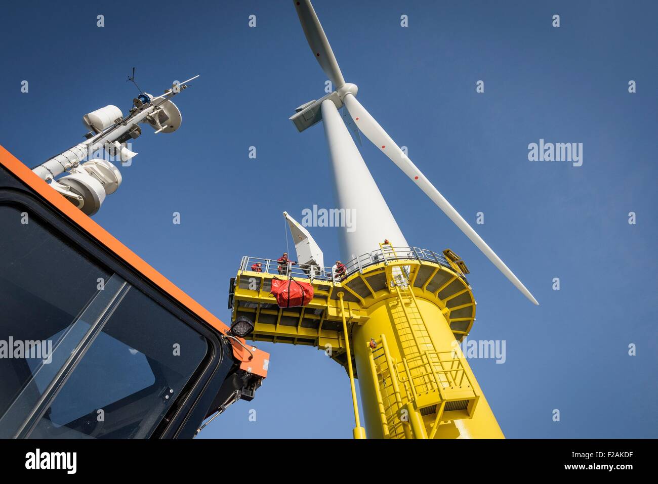Man climbing wind turbine High Resolution Stock Photography and Images ...