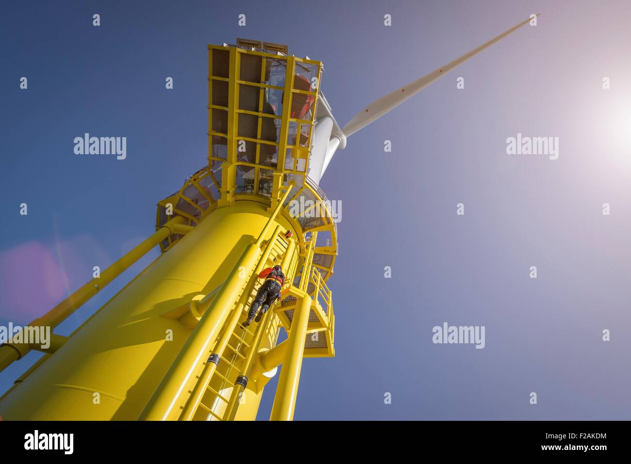 Engineer climbing wind turbine High Resolution Stock Photography and ...