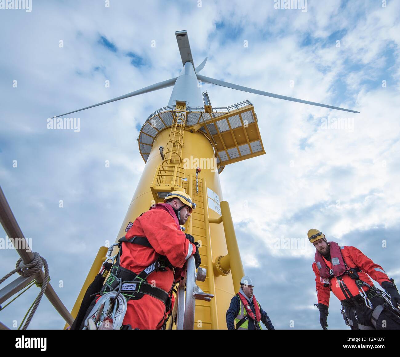 Man climbing wind turbine High Resolution Stock Photography and Images ...
