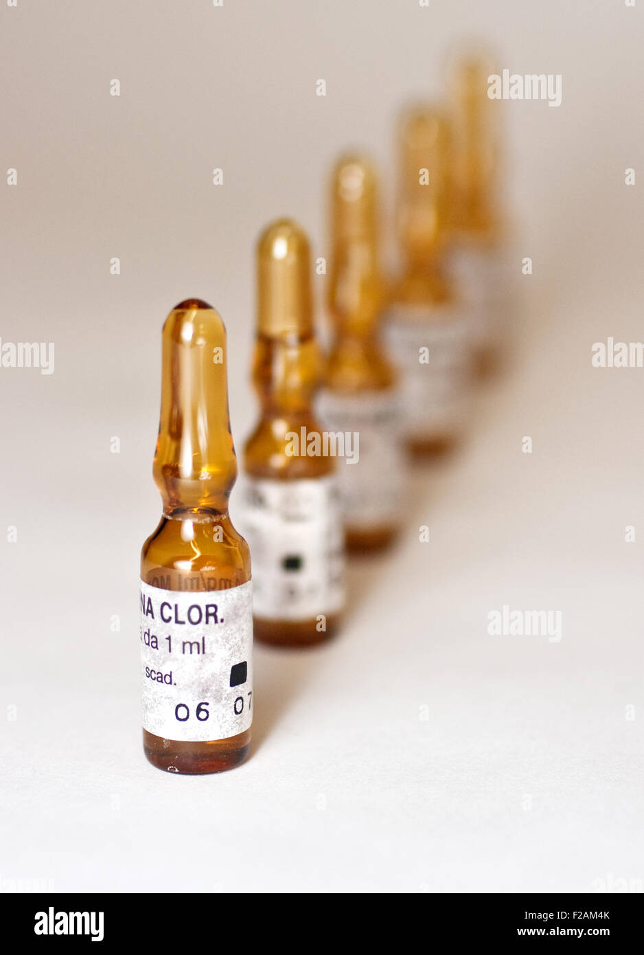 Ampoules, medicine on a gray background Stock Photo - Alamy