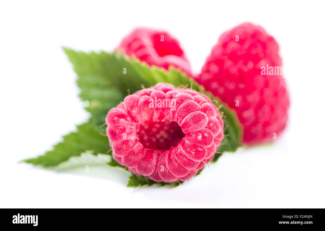 Raspberries close-up shot isolated on pure white background Stock Photo ...