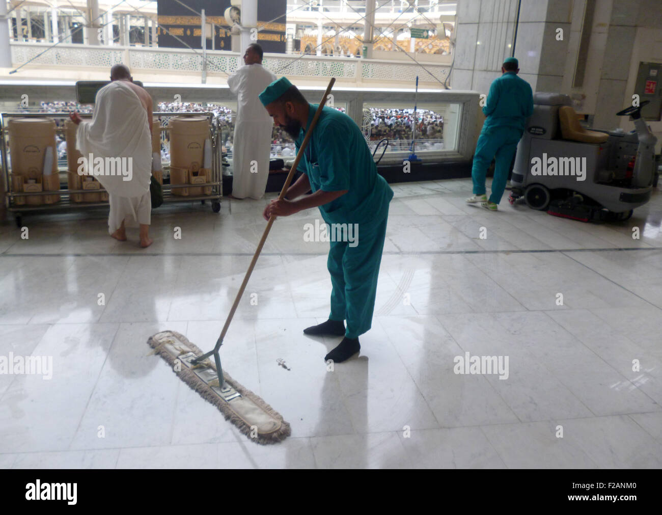 Mecca, Mecca, Saudi Arabia. 12th Sep, 2014. A worker cleans up as ...