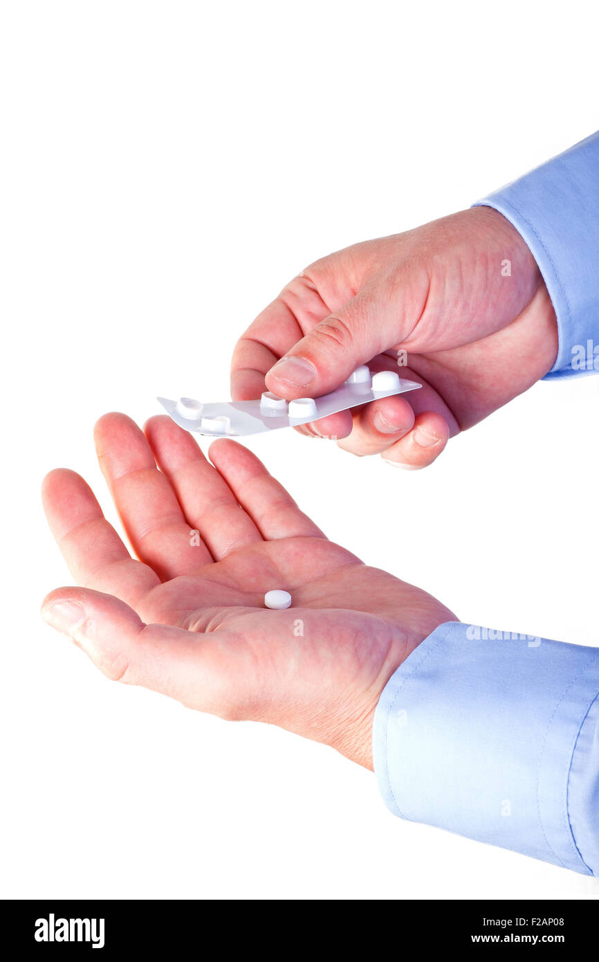 Medicine pills hand thumb Cut Out Stock Images & Pictures - Alamy