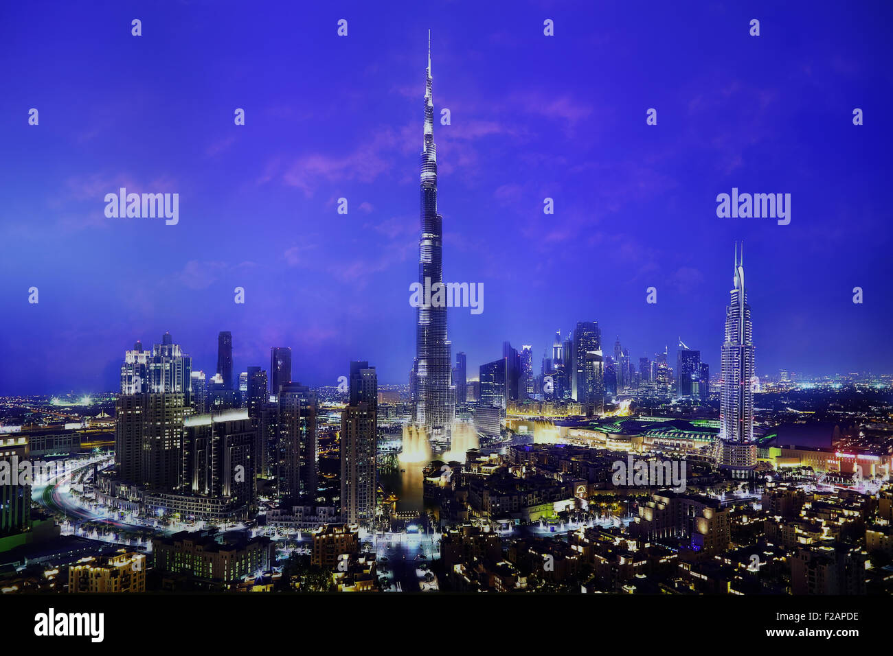 skyscrapers in Dubai and blue sky at night Stock Photo - Alamy