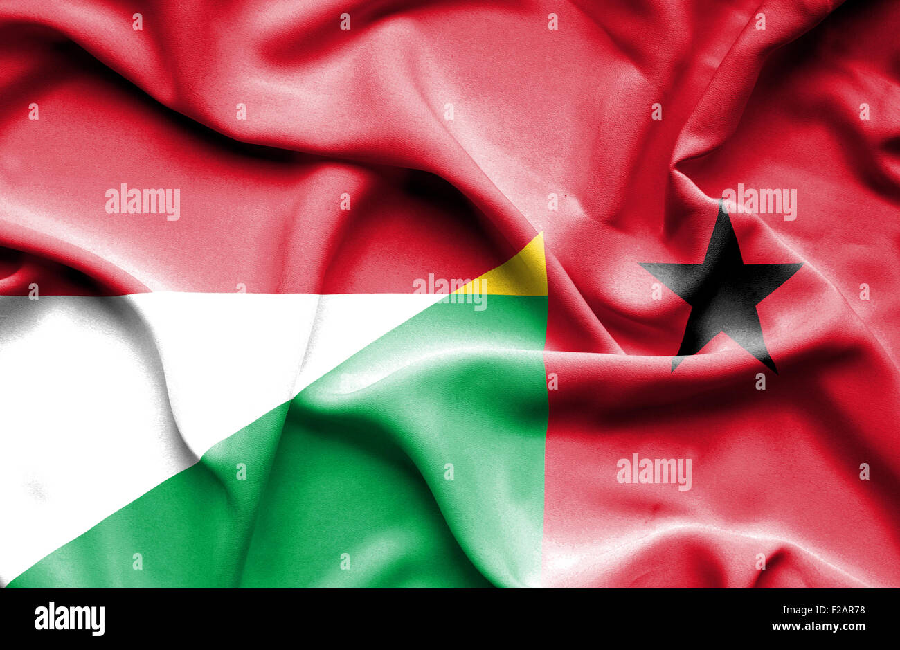Indonesia guinea bissau flag hi-res stock photography and images - Alamy
