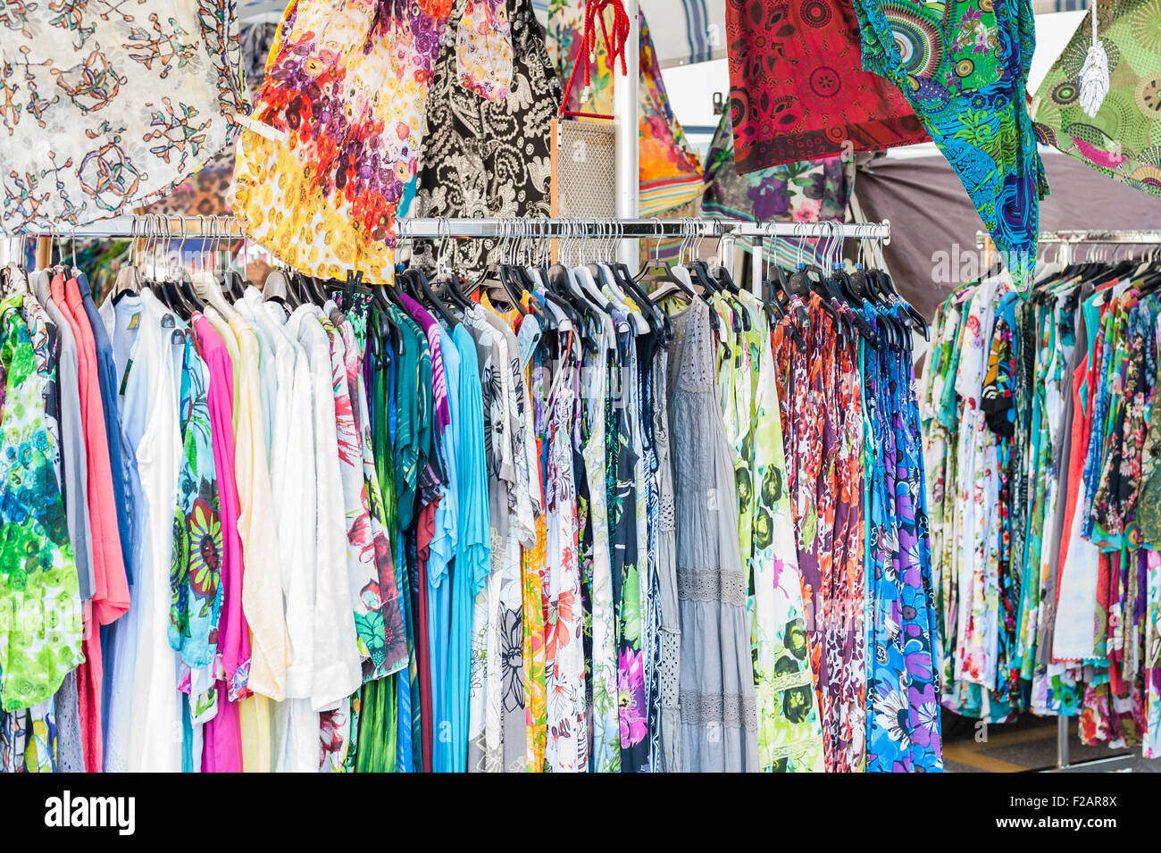 Clothes for sale at a local outdoor market. Italy Stock Photo - Alamy