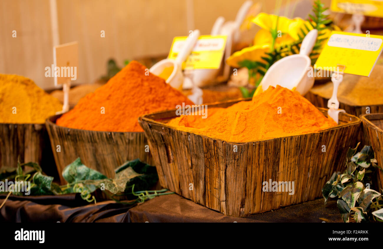 Turmeric on wooden basket in a street market Stock Photo - Alamy