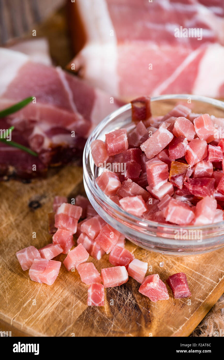 Diced Ham with Rosemary, Salt and pepper on wooden background Stock ...