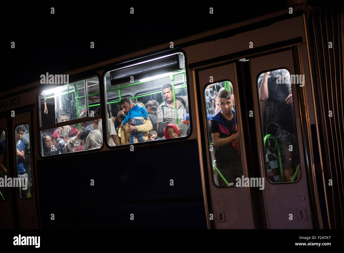 Roszke, Hungary. 14th Sep, 2015. A bus brings the refugees to the ...