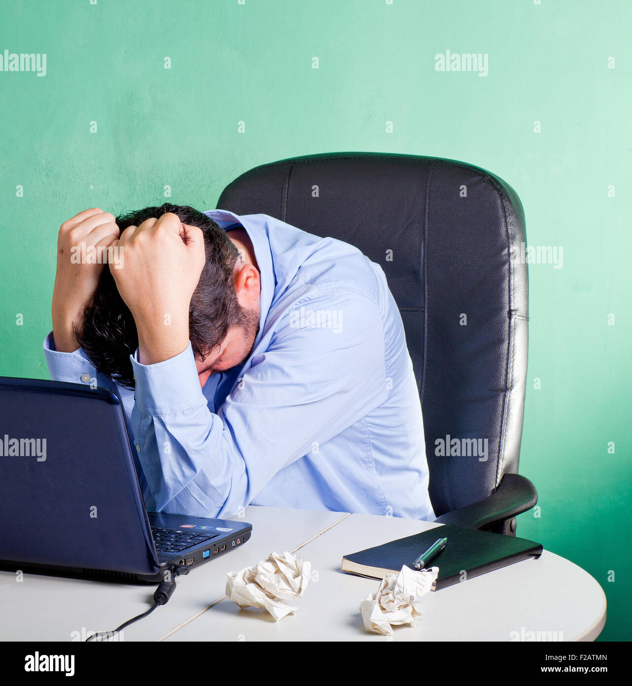 Frustrated and desperate businessman in his office Stock Photo - Alamy