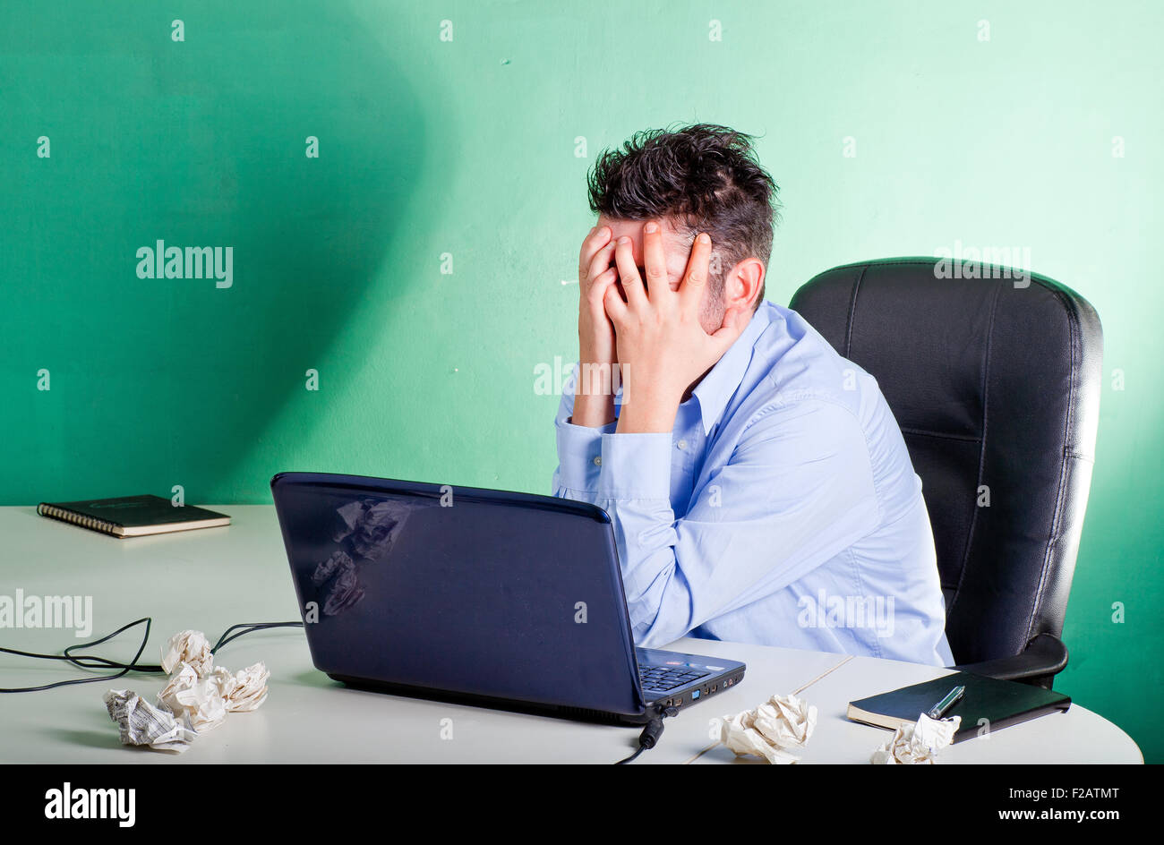Frustrated and desperate businessman in his office Stock Photo - Alamy