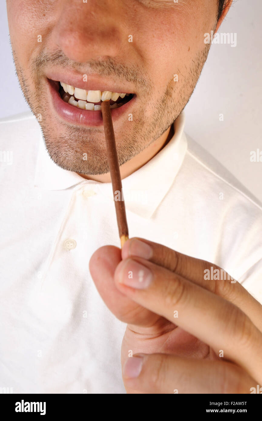 Eating biscuit stick Snack Mikado- comiendo snack palillo de pan Mikado ...