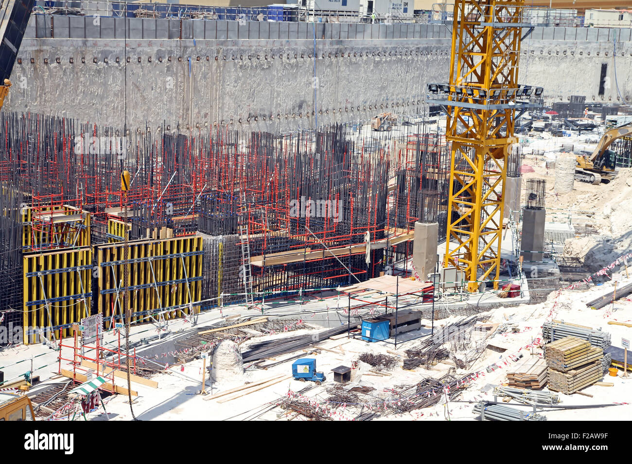 A construction yard with materials and working machines Stock Photo - Alamy