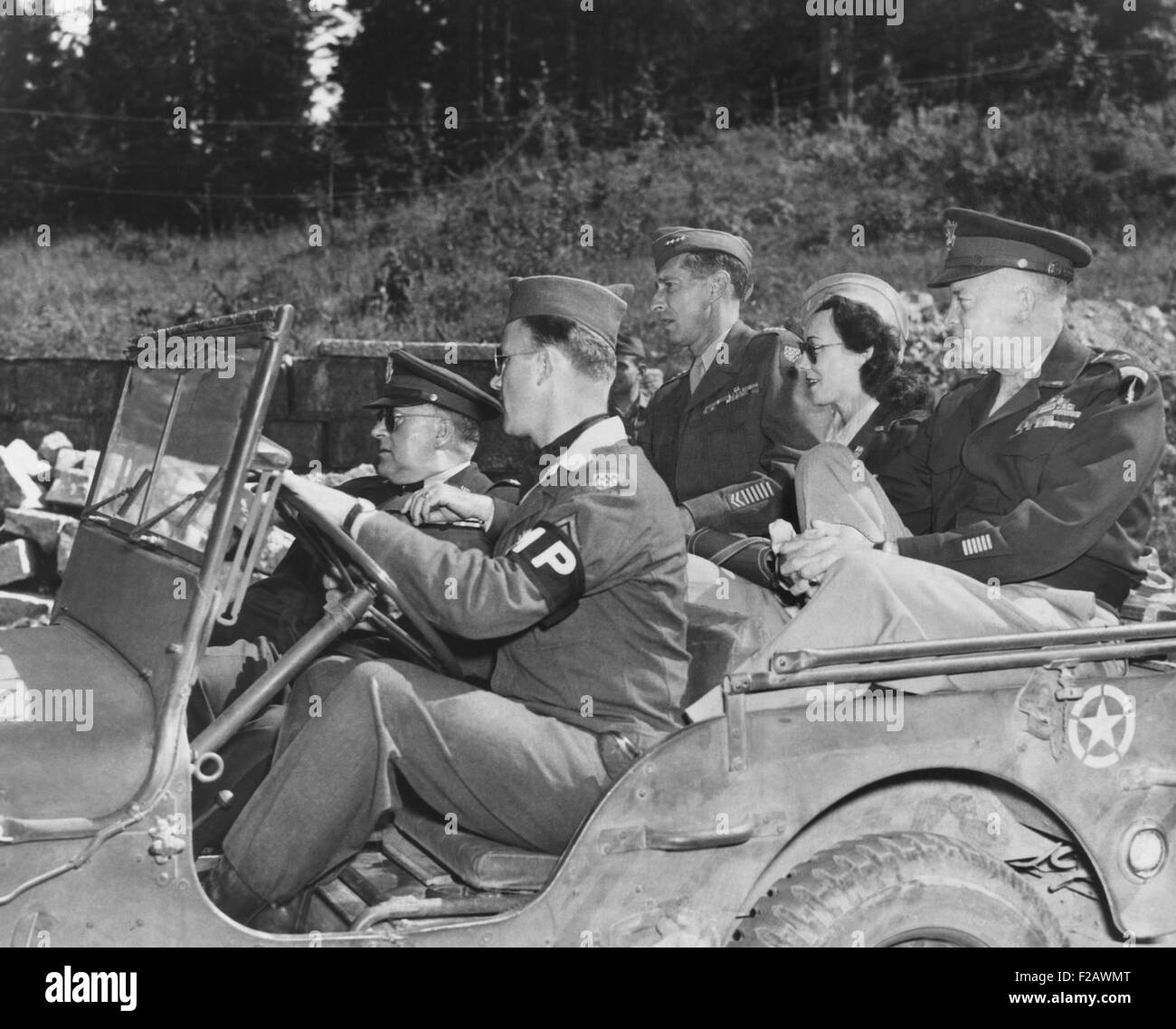 Kay Summersby at her typewriter with her pet scottie Telek. After ...