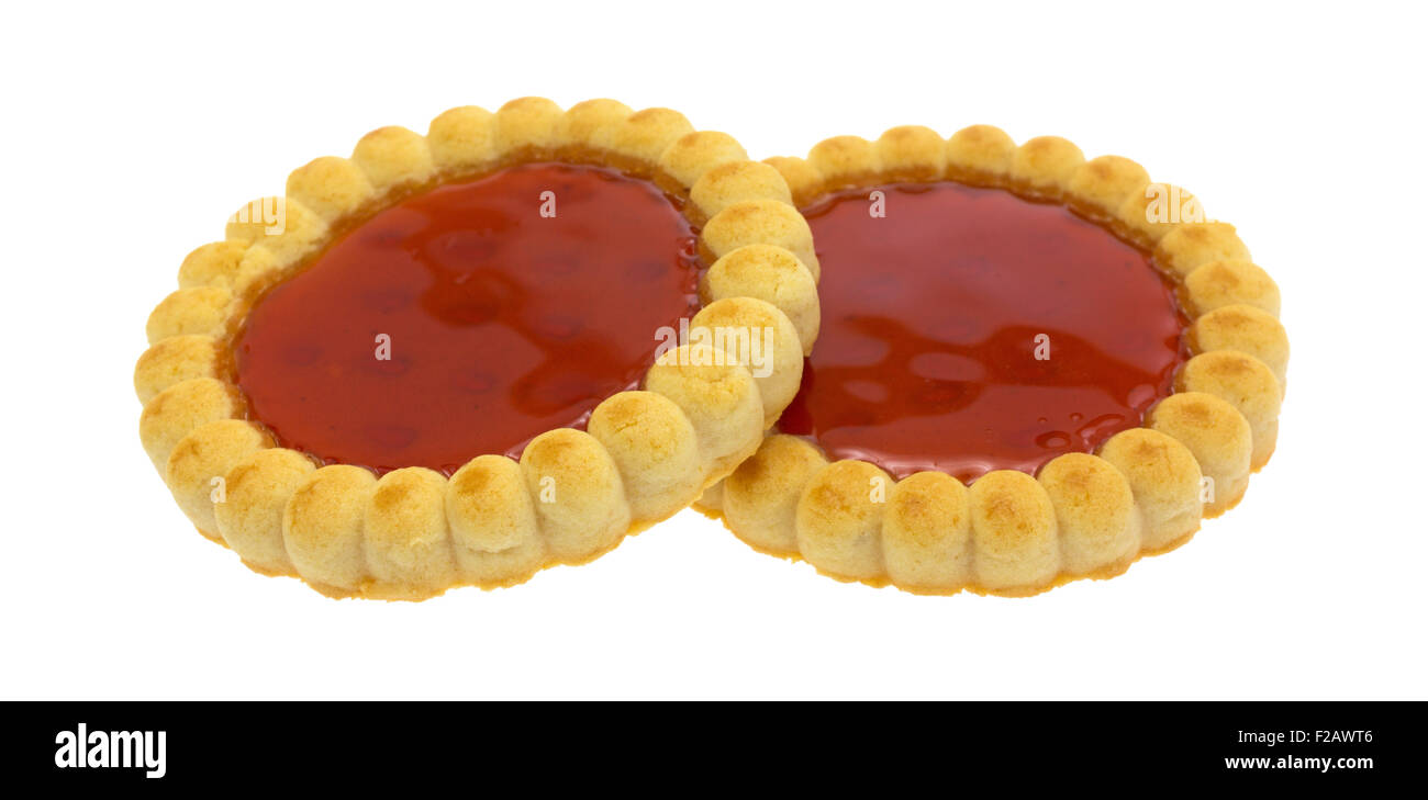 Two strawberry filled small tarts isolated on a white background Stock ...