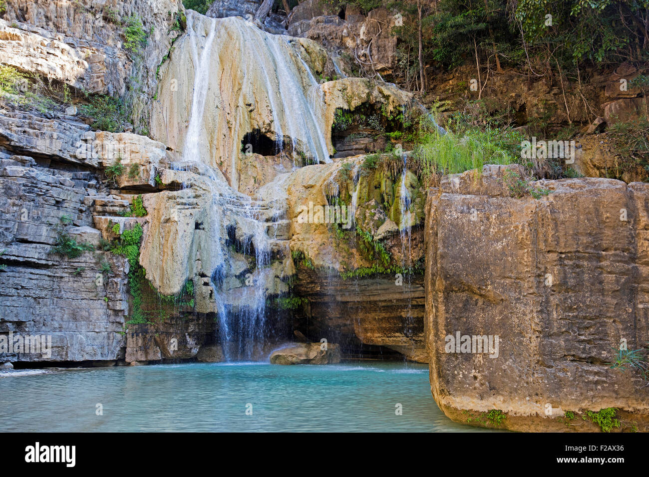 Waterfall in rock face on the Tsiribihina / Tsiribinha river in Menabe ...