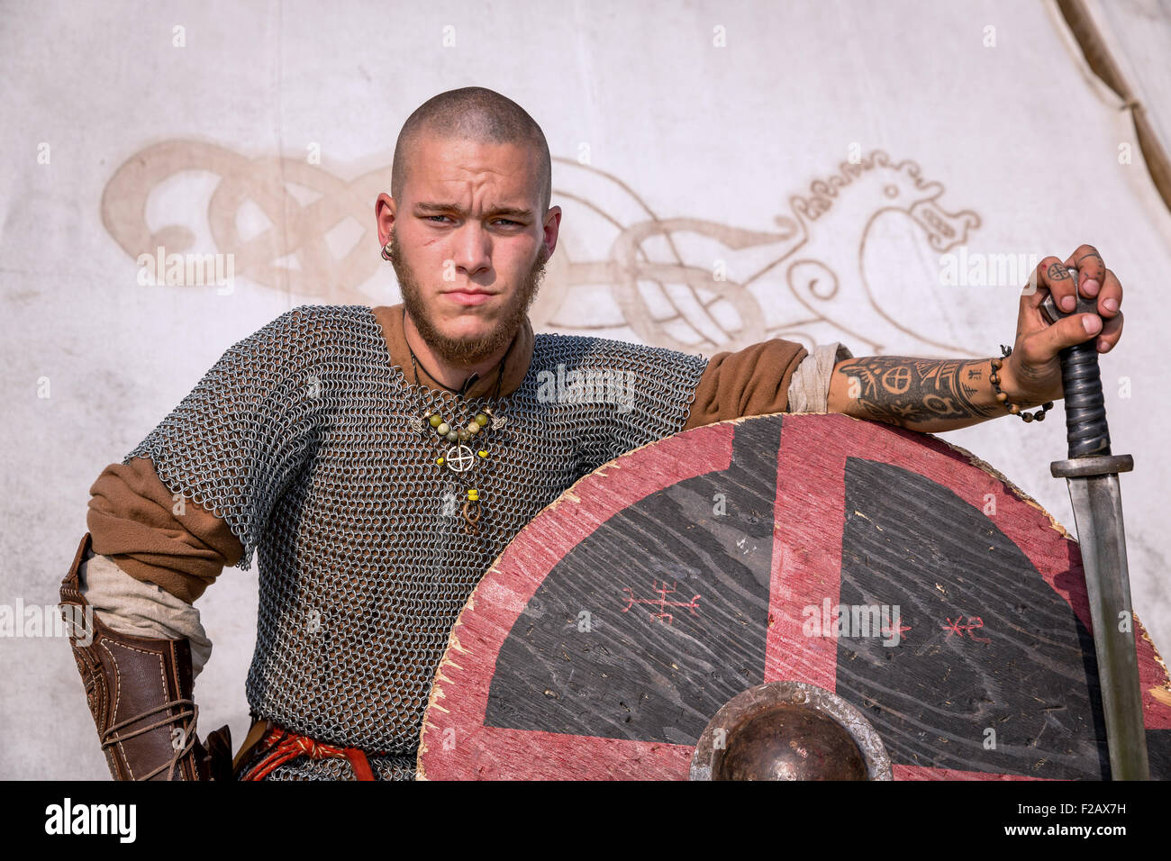 A close-up of a man dressed as a viking with shield and sword, Ishøj ...