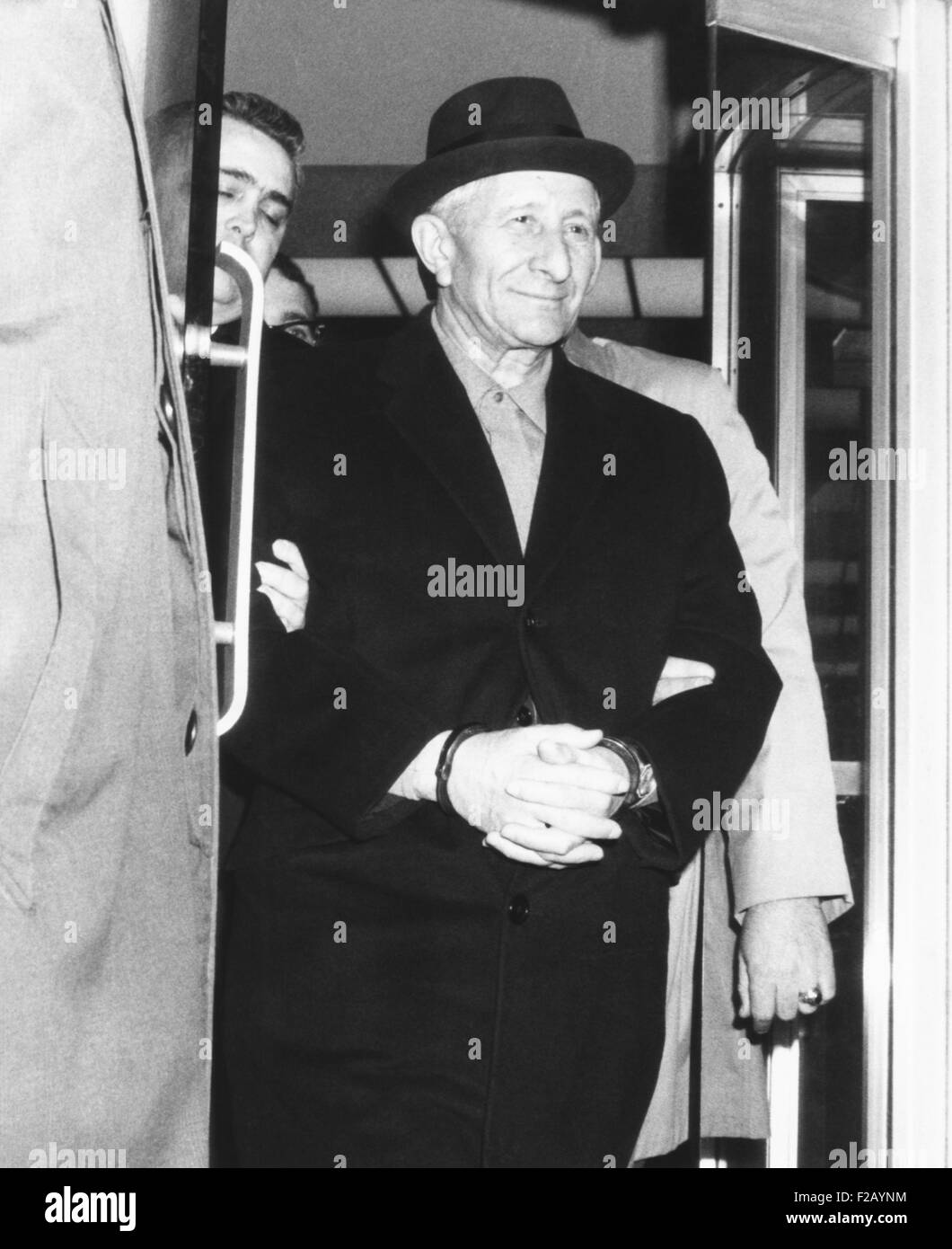 Handcuffed Carlo Gambino is led from FBI headquarters on March 23, 1970 ...