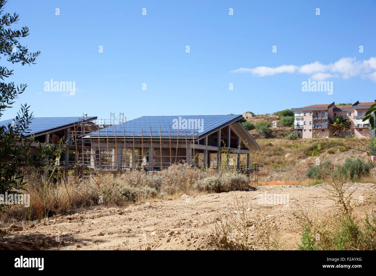Solar panels in a house under construction, Italy Stock Photo - Alamy