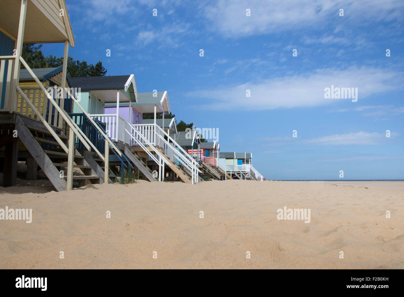 Beach huts and sand Stock Photo - Alamy