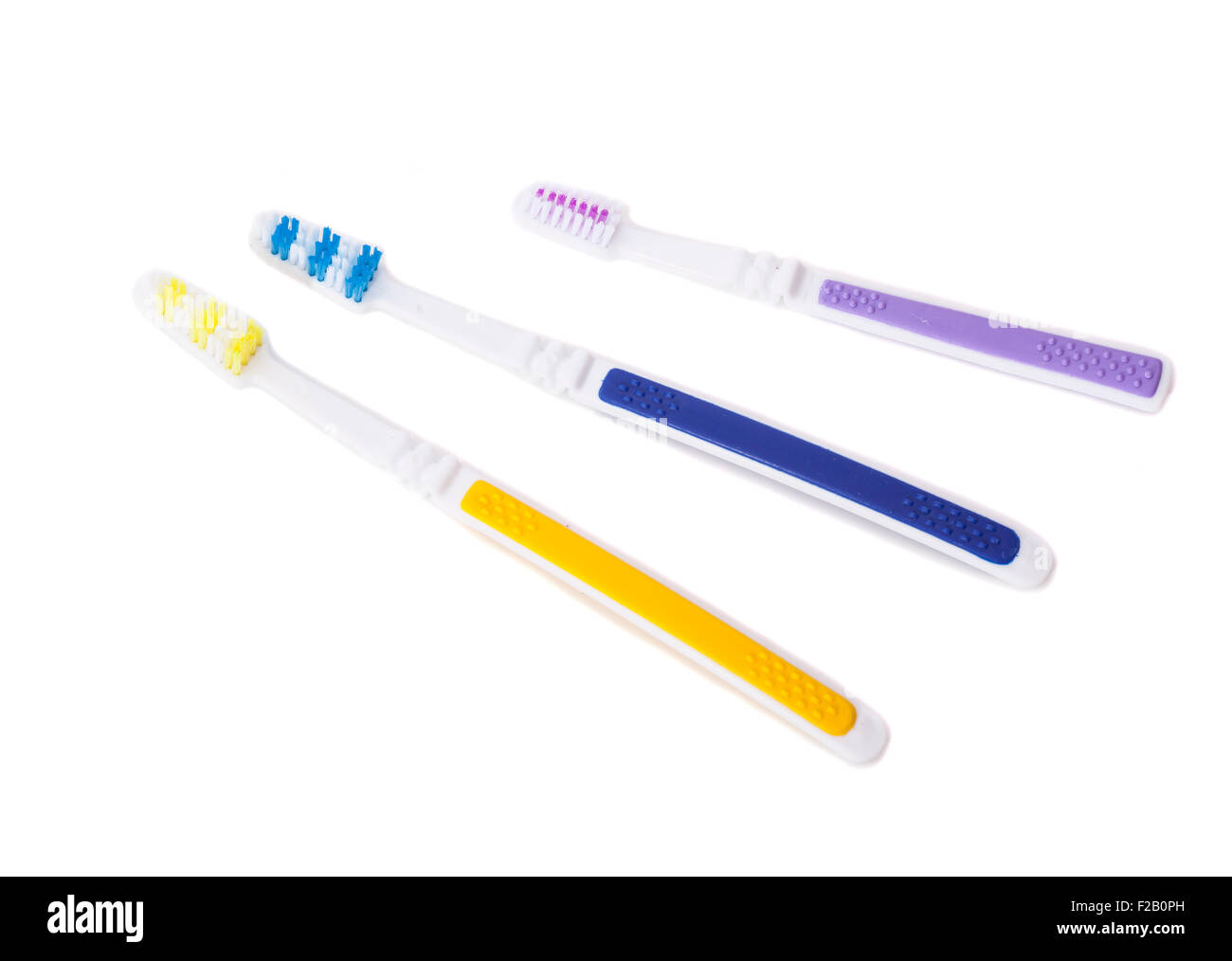 Colorful toothbrushes on white background Stock Photo - Alamy