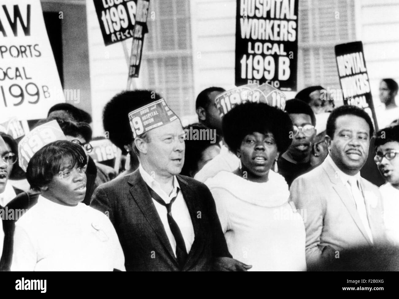 Walter Reuther and the Rev. Ralph Abernathy marching with striking ...