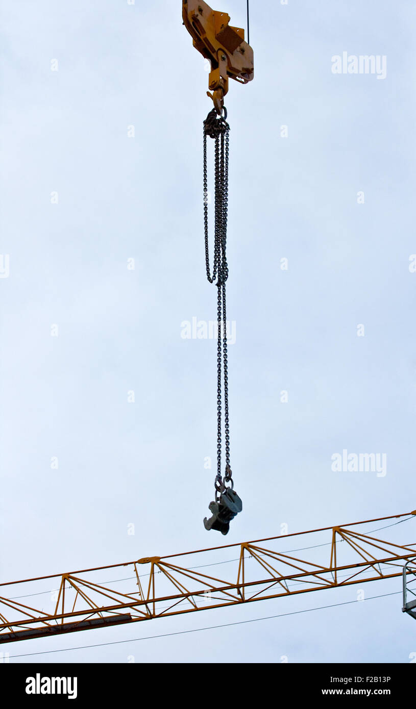 Chain hanging from the crane Stock Photo - Alamy
