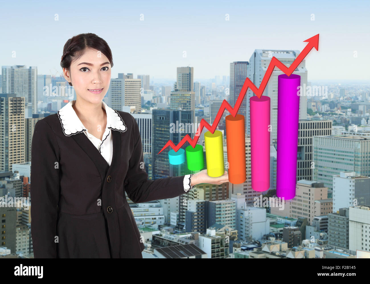 Business woman with business graph with city background Stock Photo - Alamy
